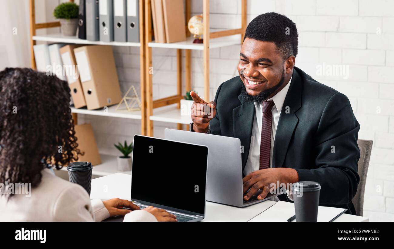 Teamwork and collaboration. Smiling colleagues having friendly ...