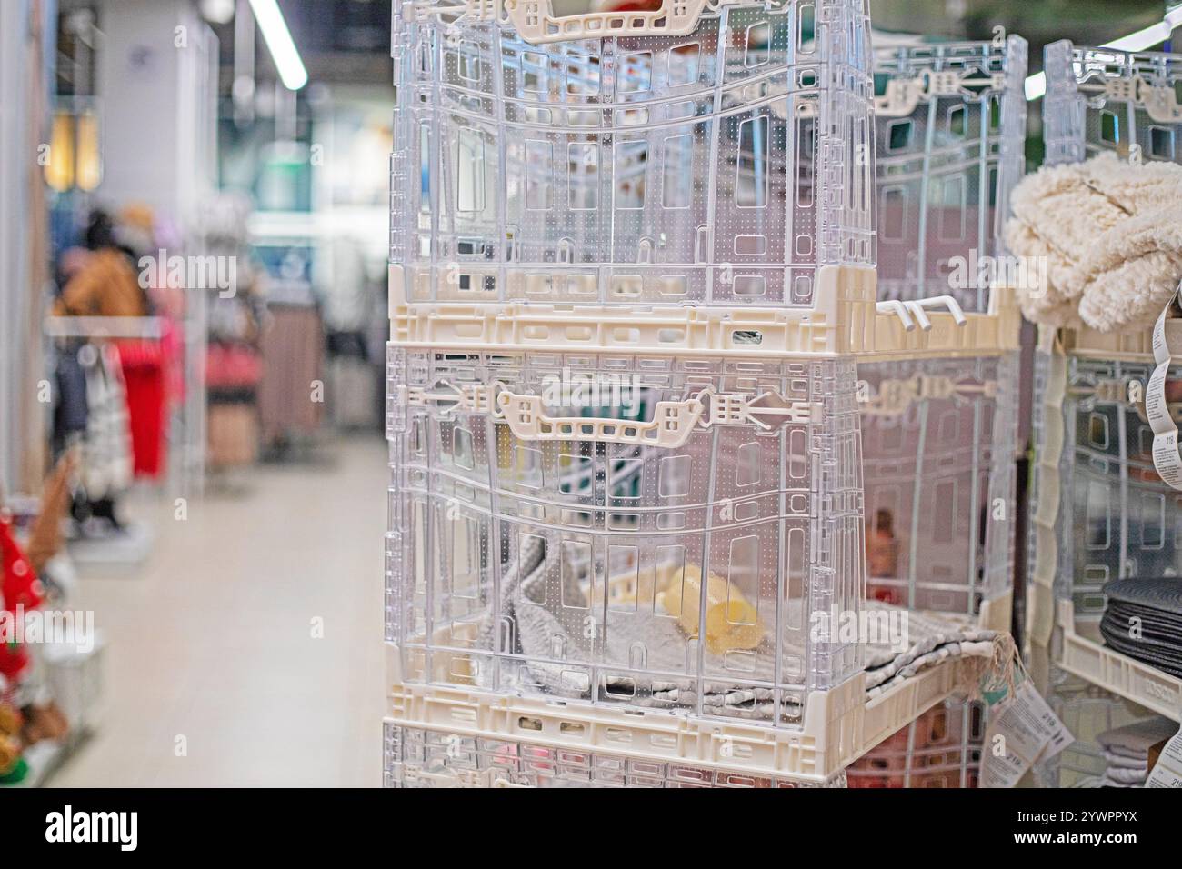 transparent plastic containers with various things for sale in a ...