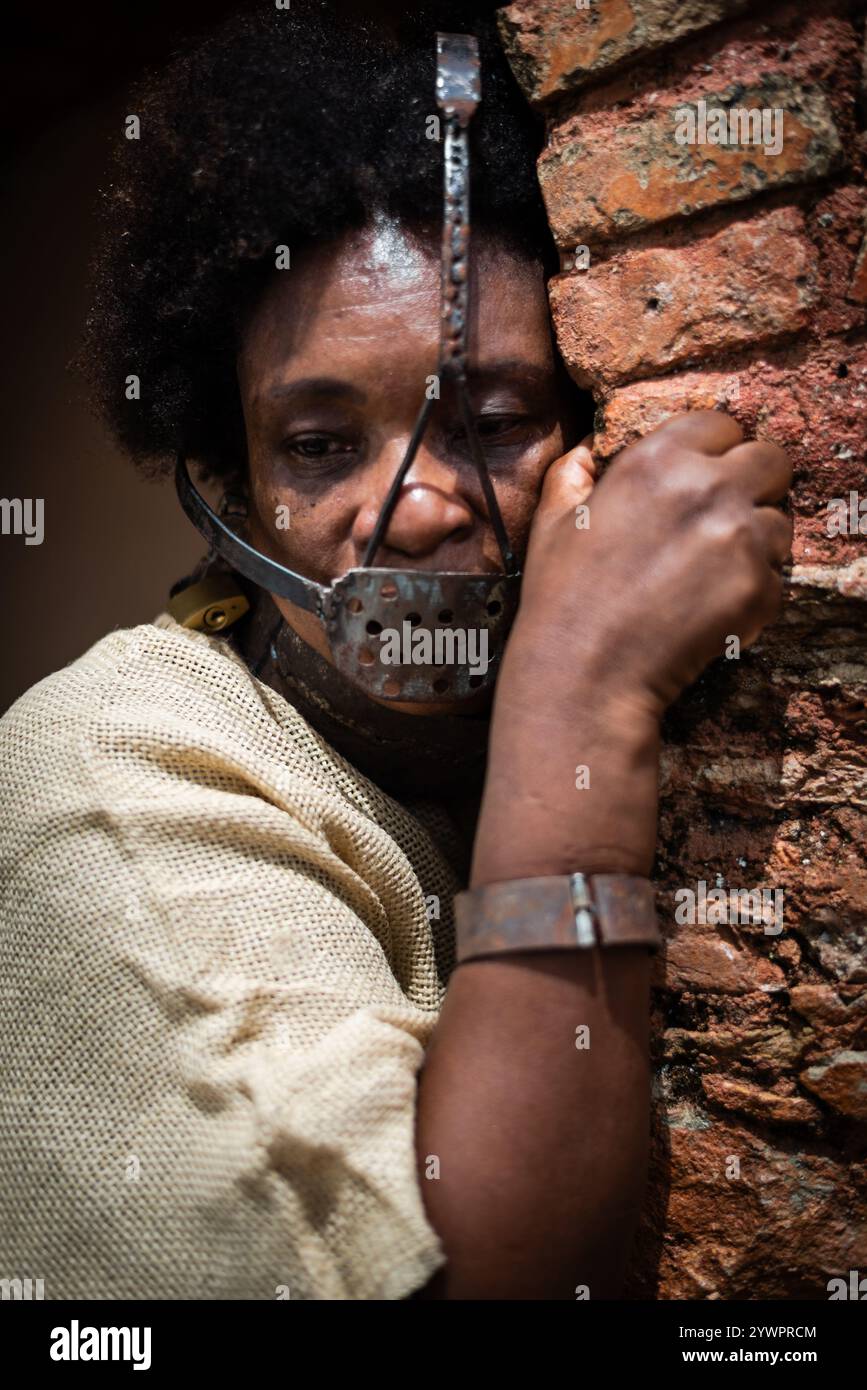 Prisoner chained brick wall hi-res stock photography and images - Alamy