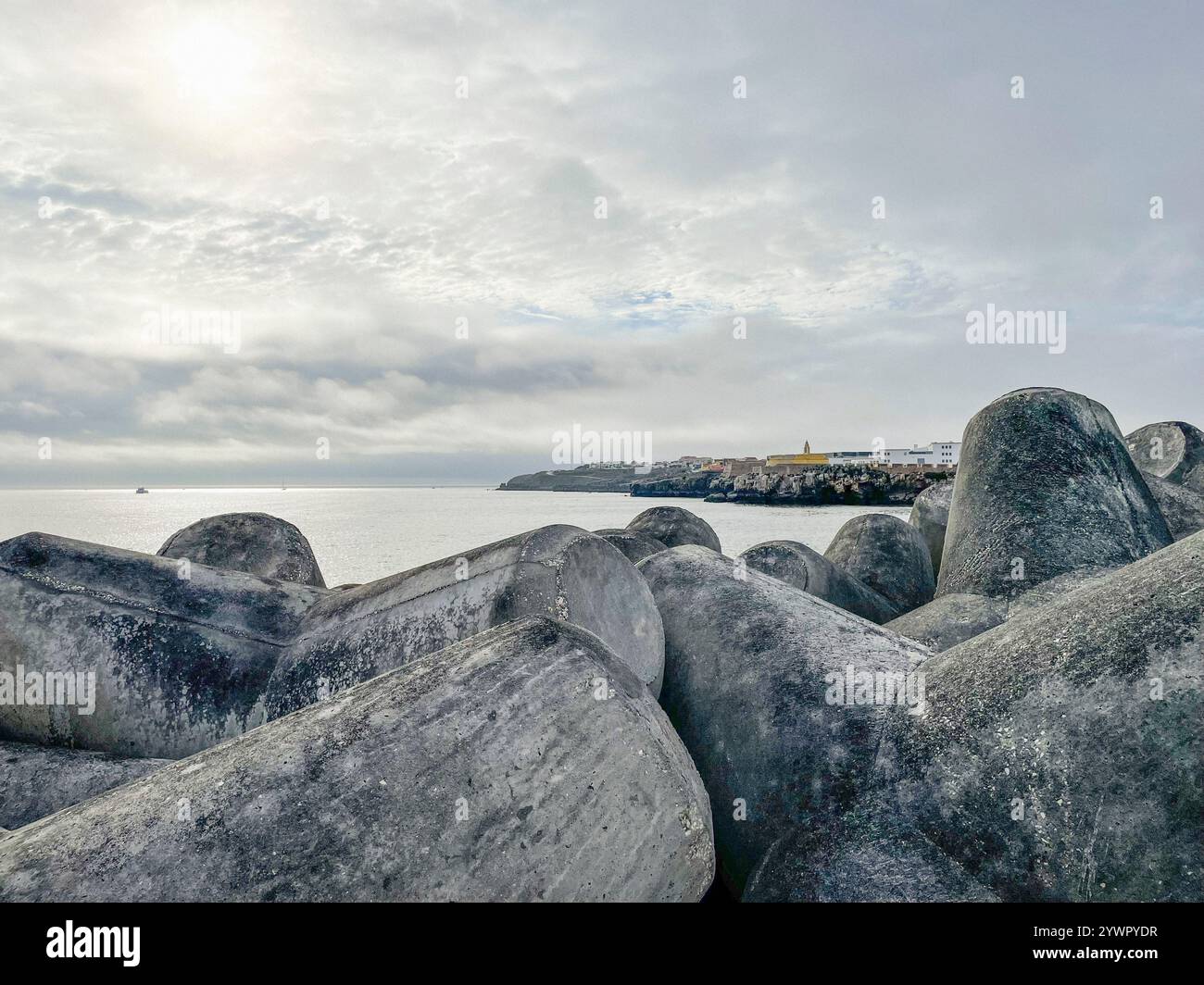 Portugal, Peniche, concrete tide blocks on the pier Stock Photo - Alamy