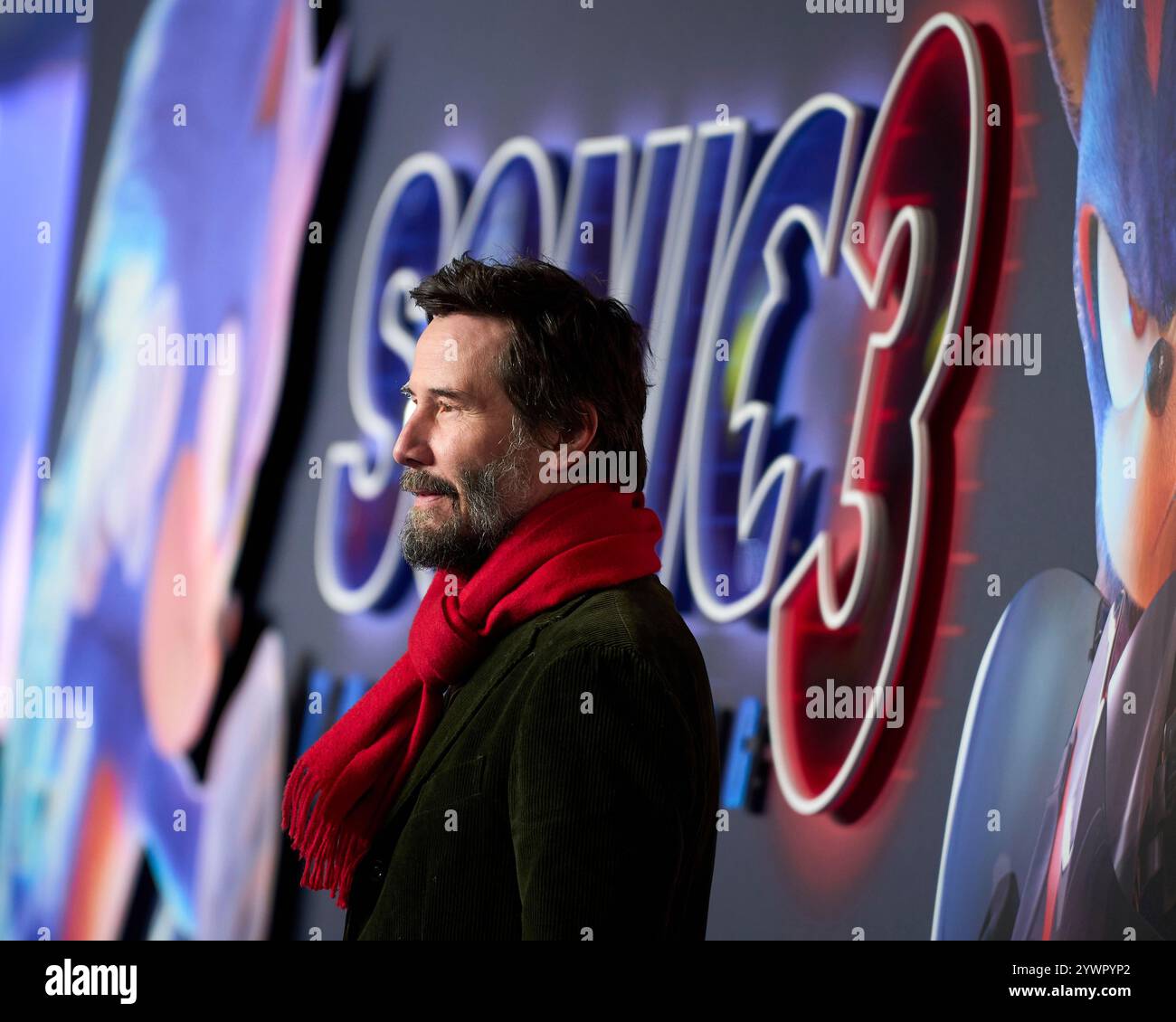 Keanu Reeves poses for photographers upon arrival at the premiere of ...