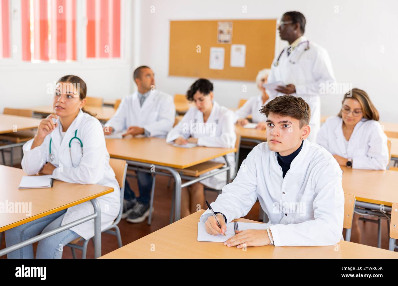 Group of medical students in classroom Stock Photo - Alamy