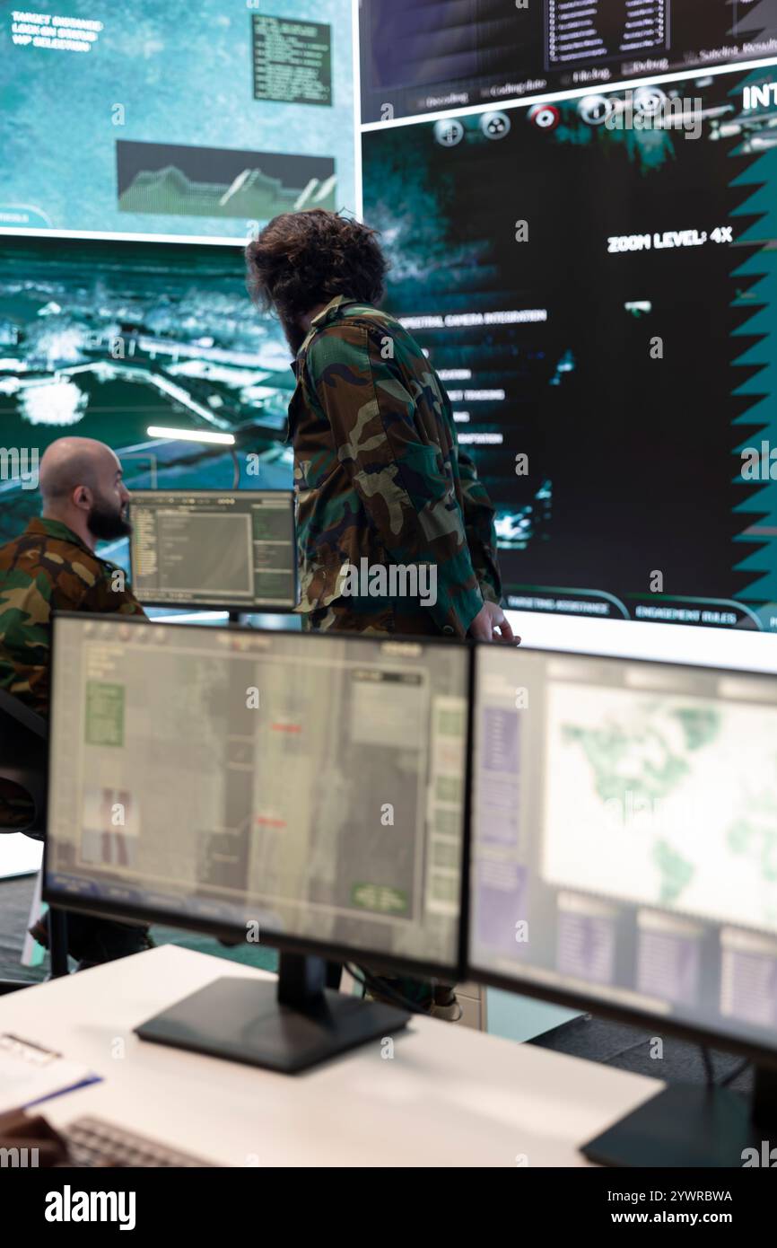 Military staff overseeing intelligence gathering activity to offer support to infantry unit in ...