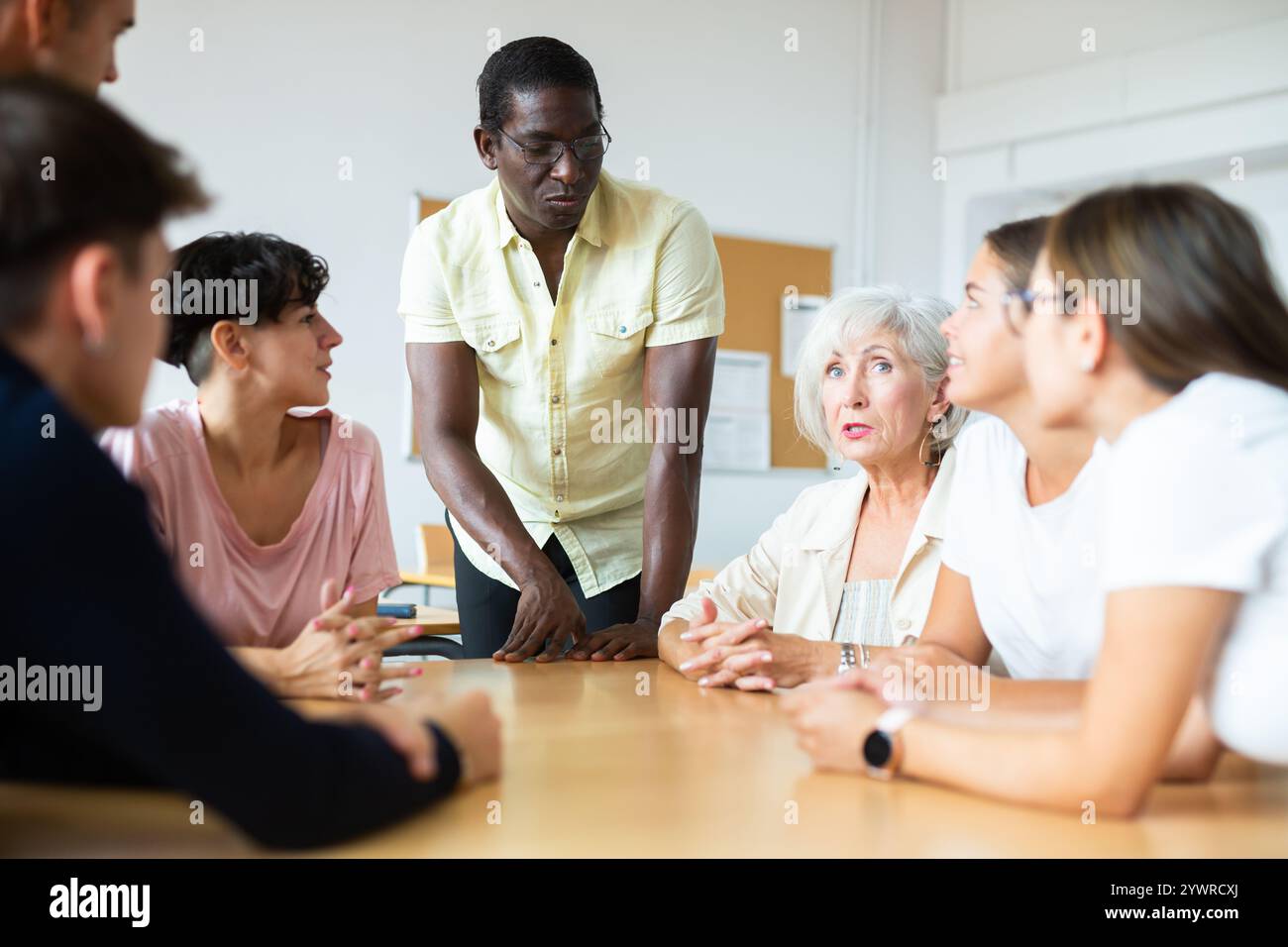 Friendly African American English tutor giving language courses to ...