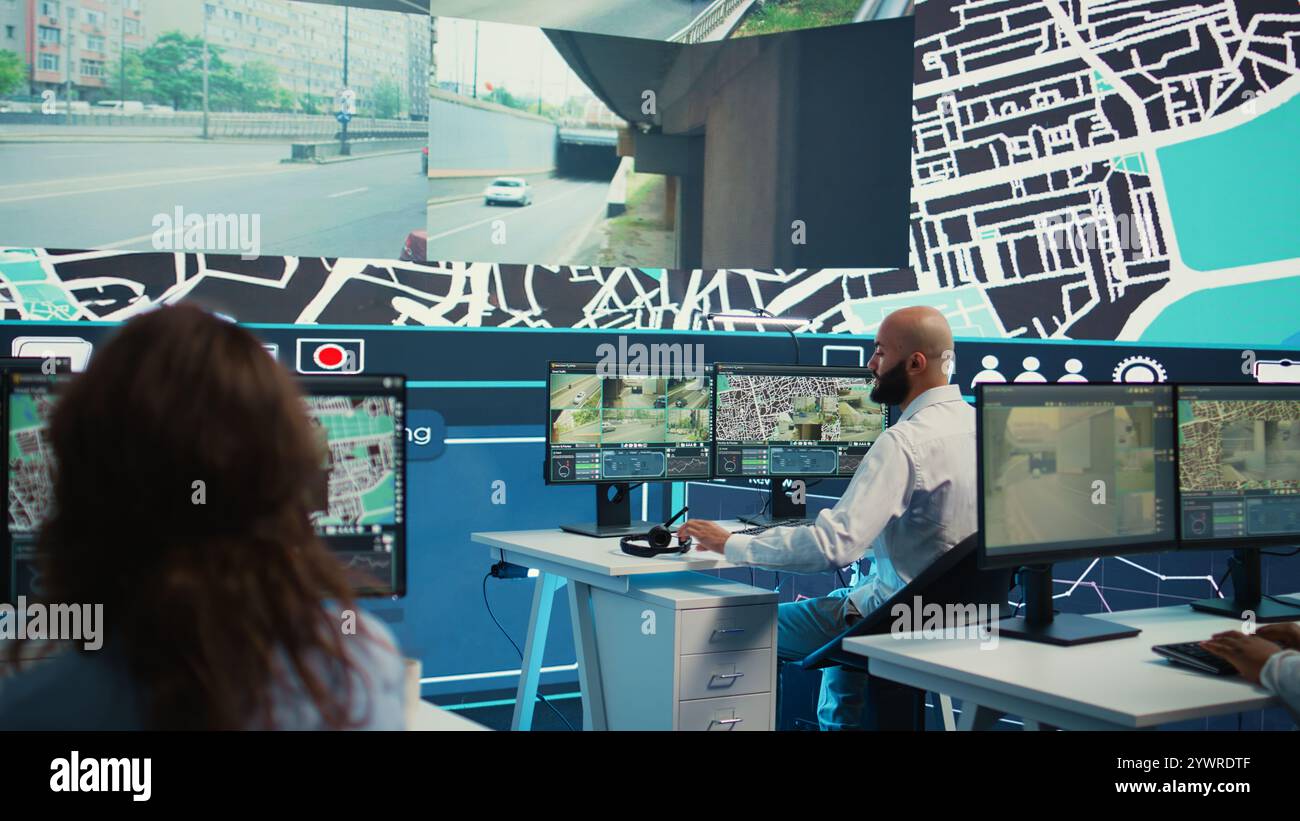 Diverse call center operators monitoring couriers in traffic and update ...