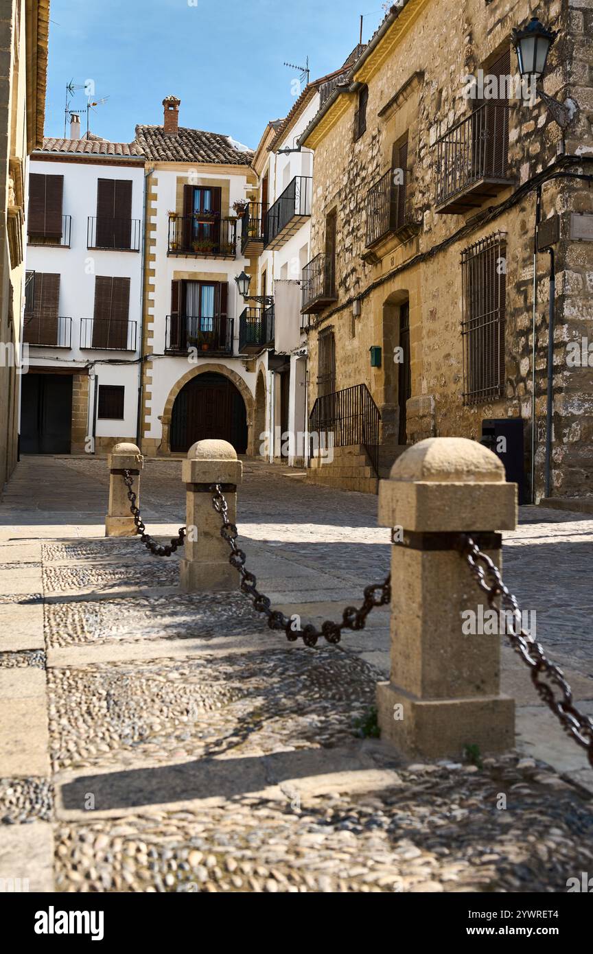 A picturesque cobblestone street features charming historic ...