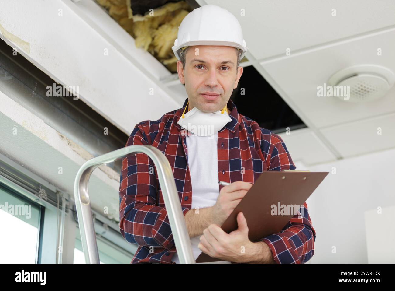 Stand on a ladder hi-res stock photography and images - Alamy