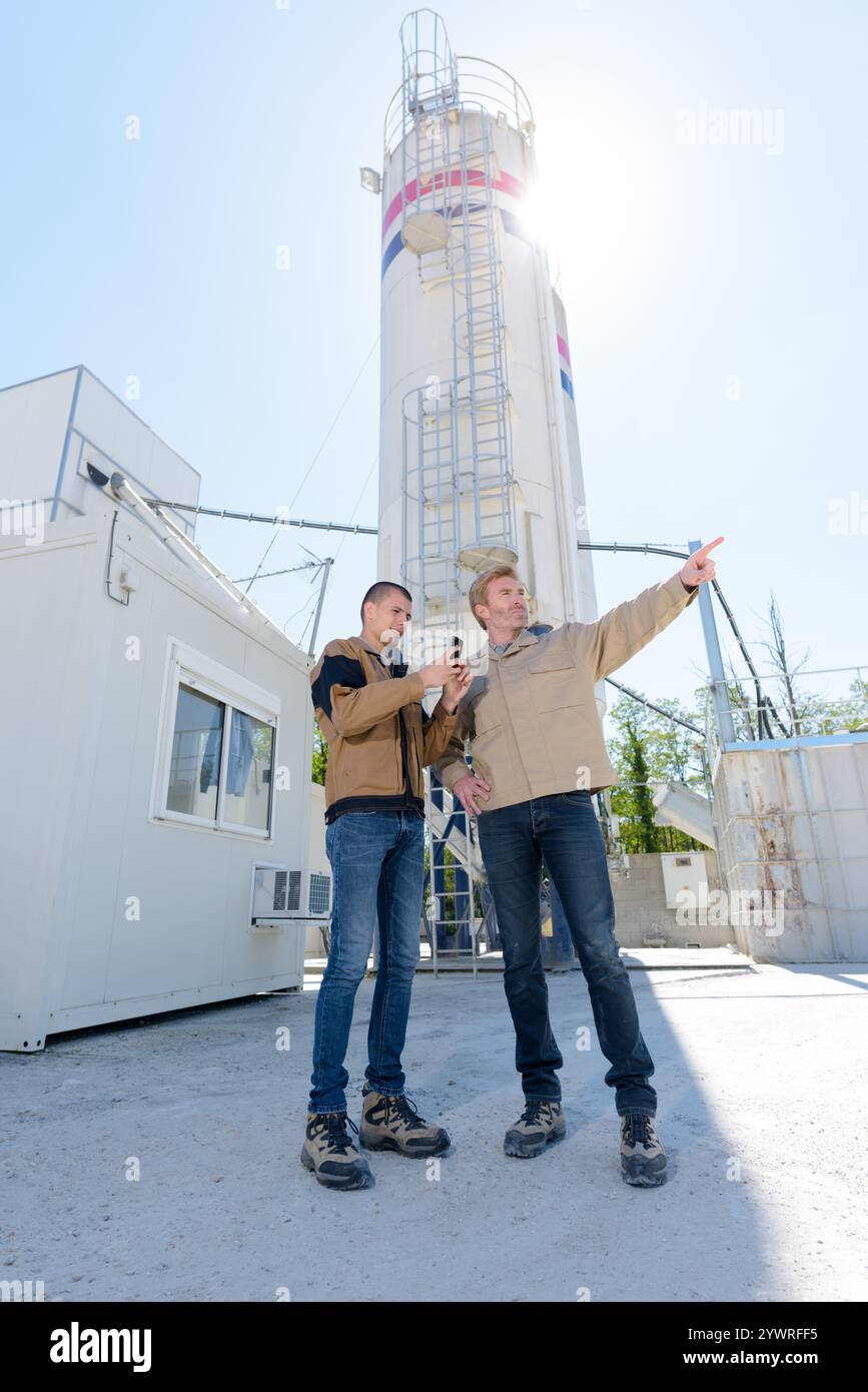 portrait of workers outside the factory Stock Photo - Alamy
