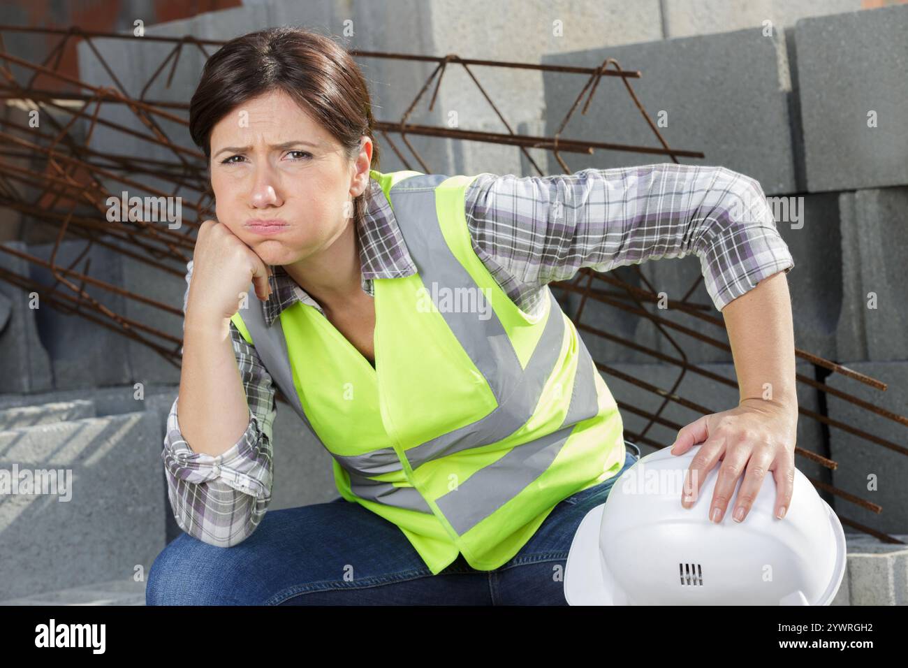 female architect sighing with exhaustion Stock Photo - Alamy
