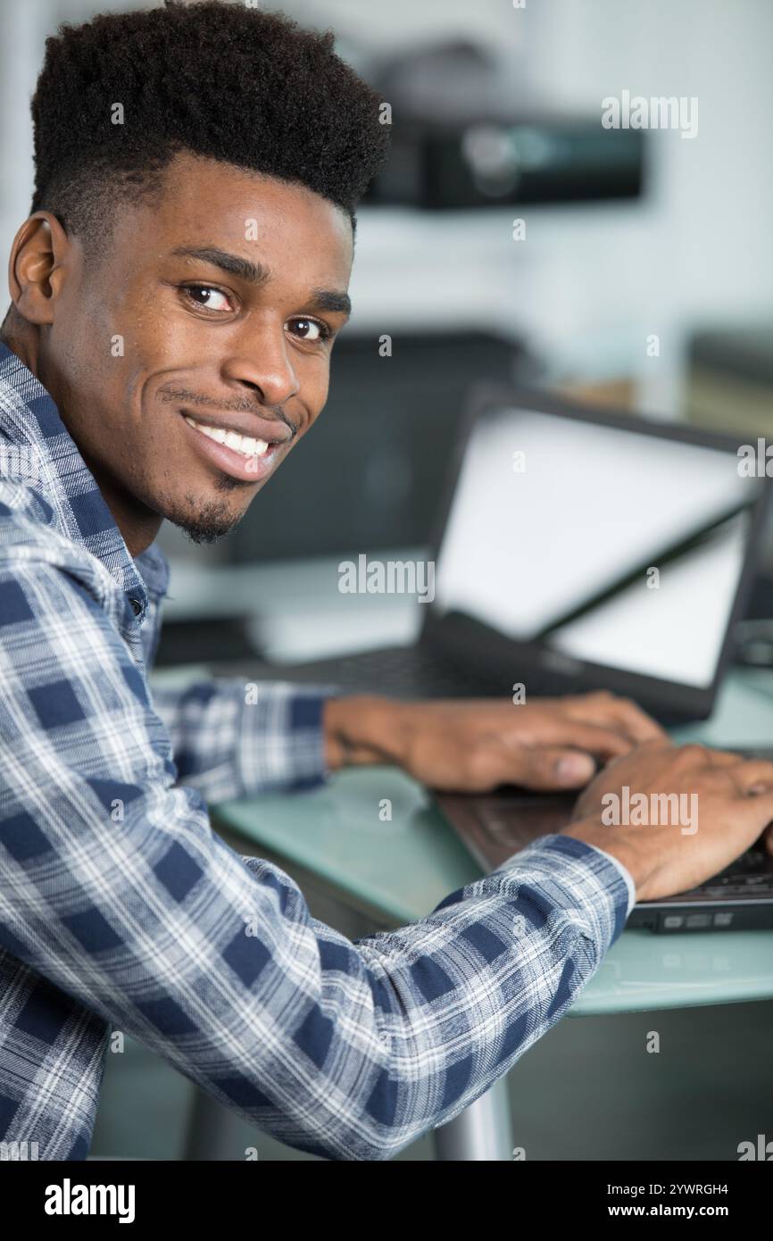 Focusing work handsome young hi-res stock photography and images - Alamy