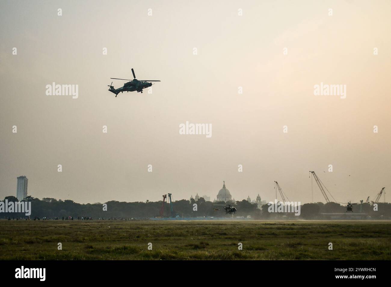Kolkata, India. 11th Dec, 2024. Indian Army personnel with helicopters ...