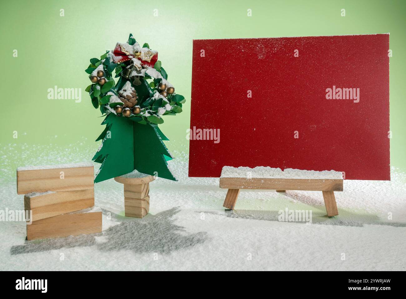 Christmas tree miniature and Christmas wreath with wooden block stack ...