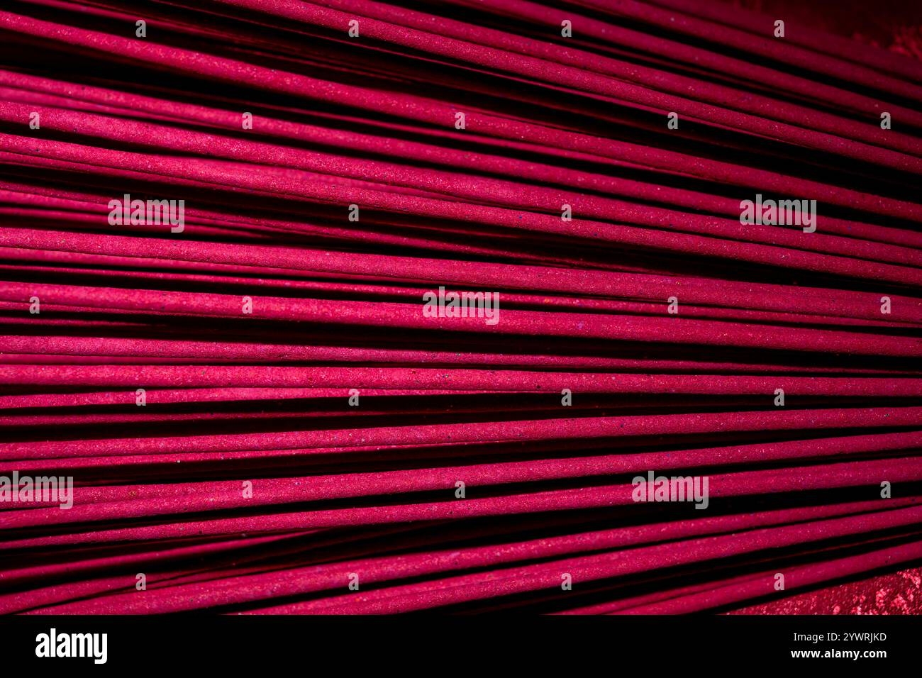 Closeup view pile of incense sticks for ritual, praying, or aromatic ...