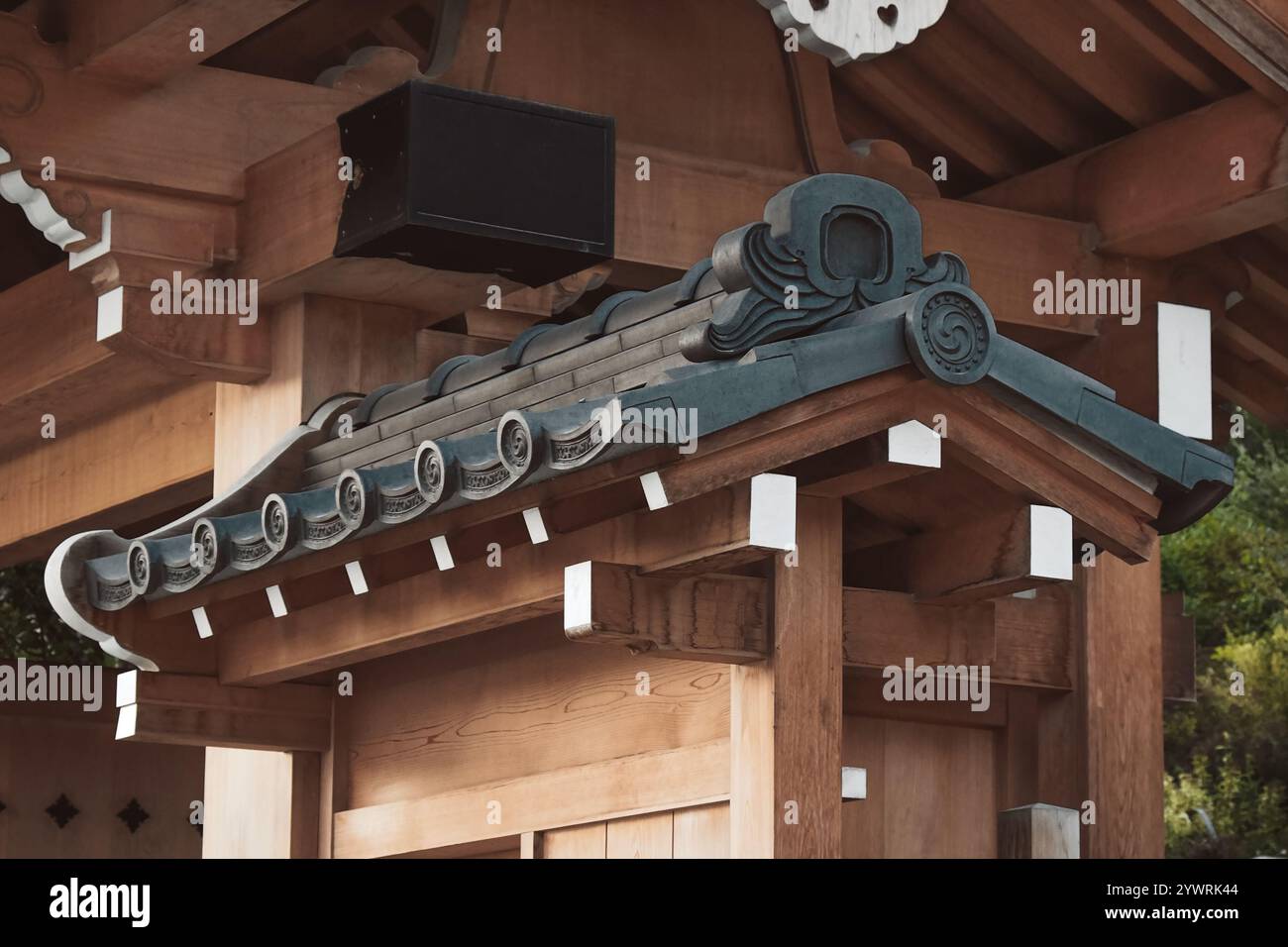 Elements of typical asian roof with carved traditional symbols on ...
