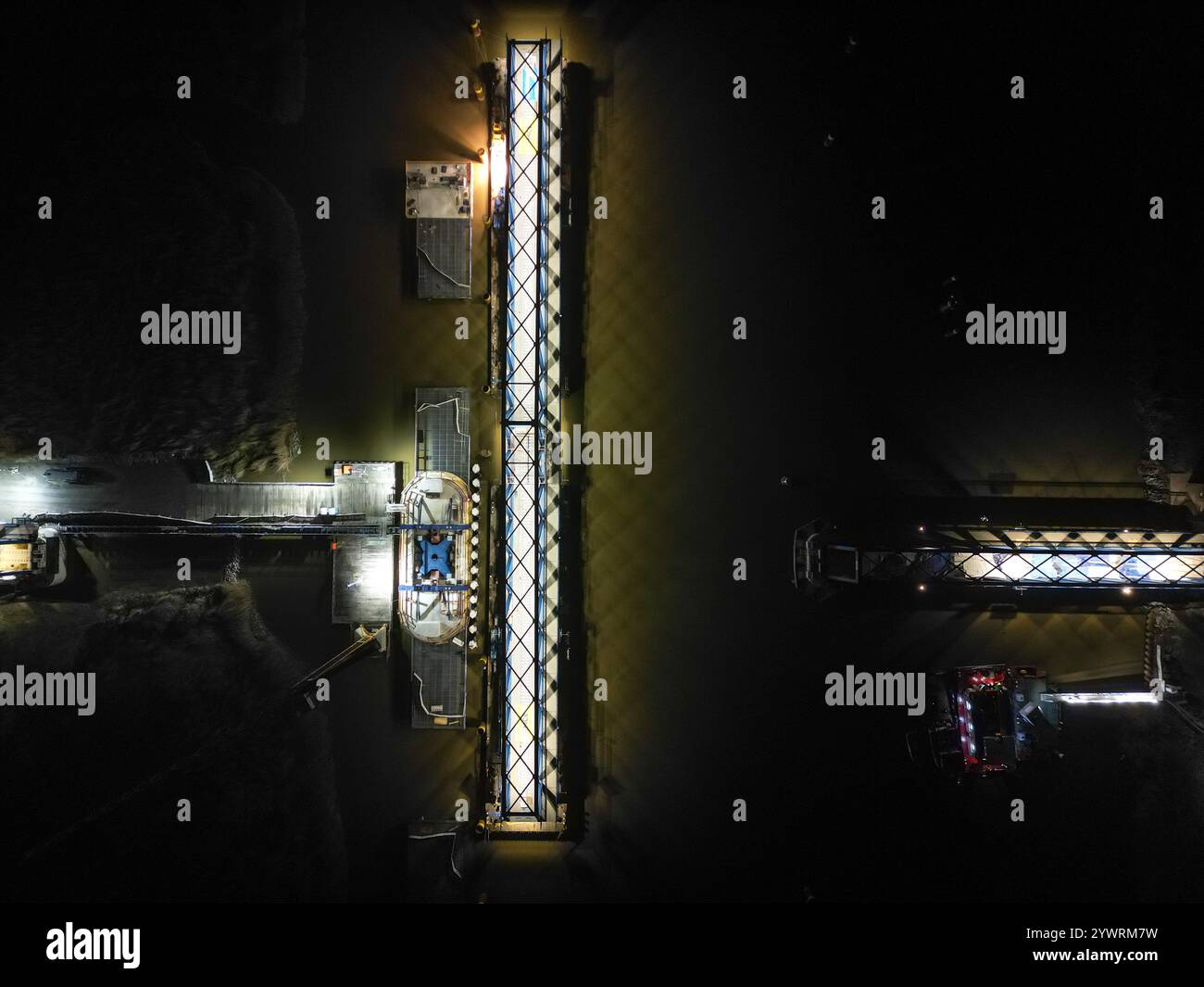 Weener, Germany. 11th Dec, 2024. The 145 meter long middle section for ...