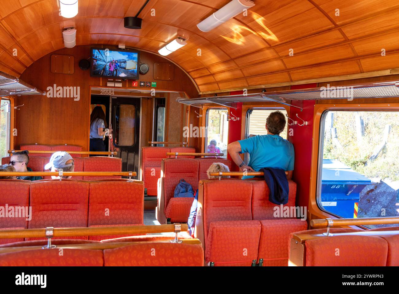 Tourists travelling in carriage on the Flam Railway as the train ...