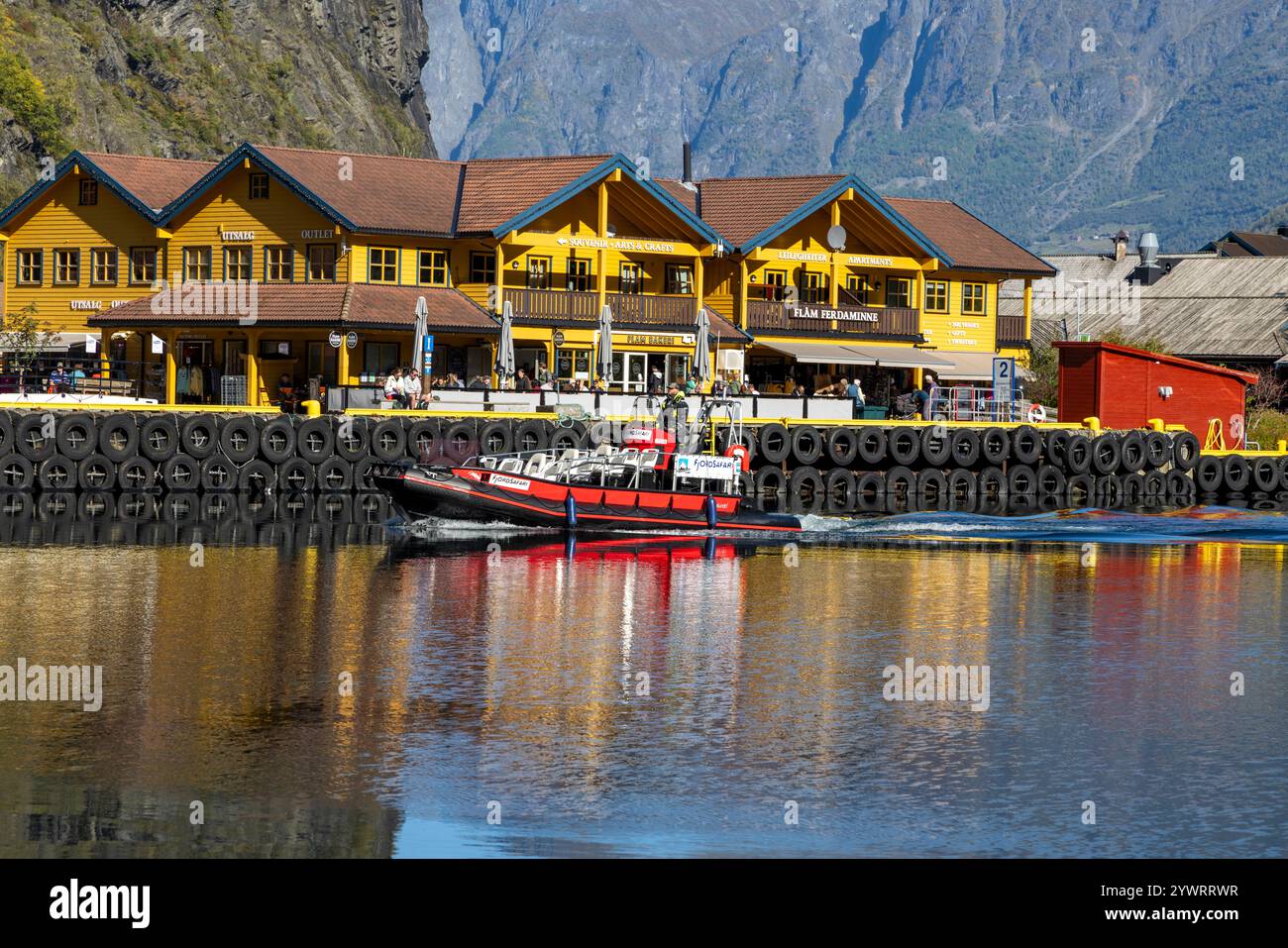 Popular tourist village of Flam with local shops and stores together ...