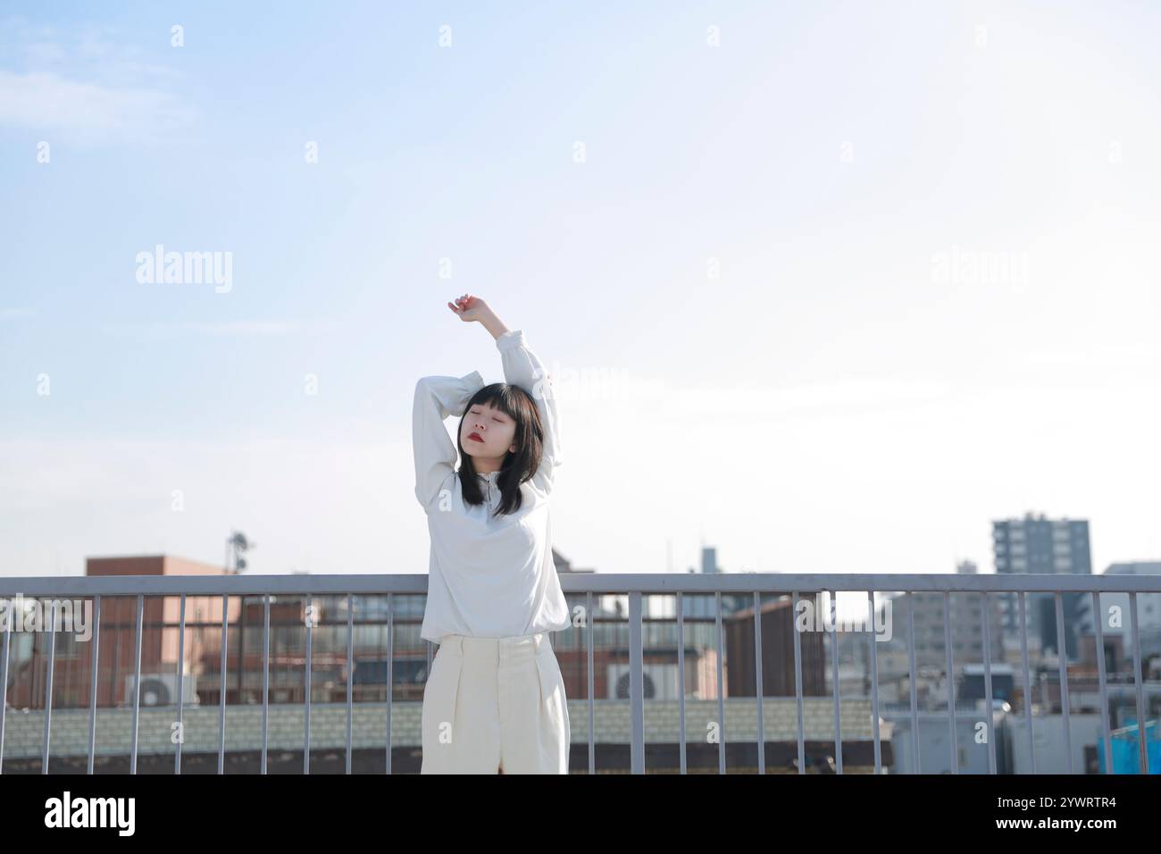 Tall woman with long hair hi-res stock photography and images - Alamy