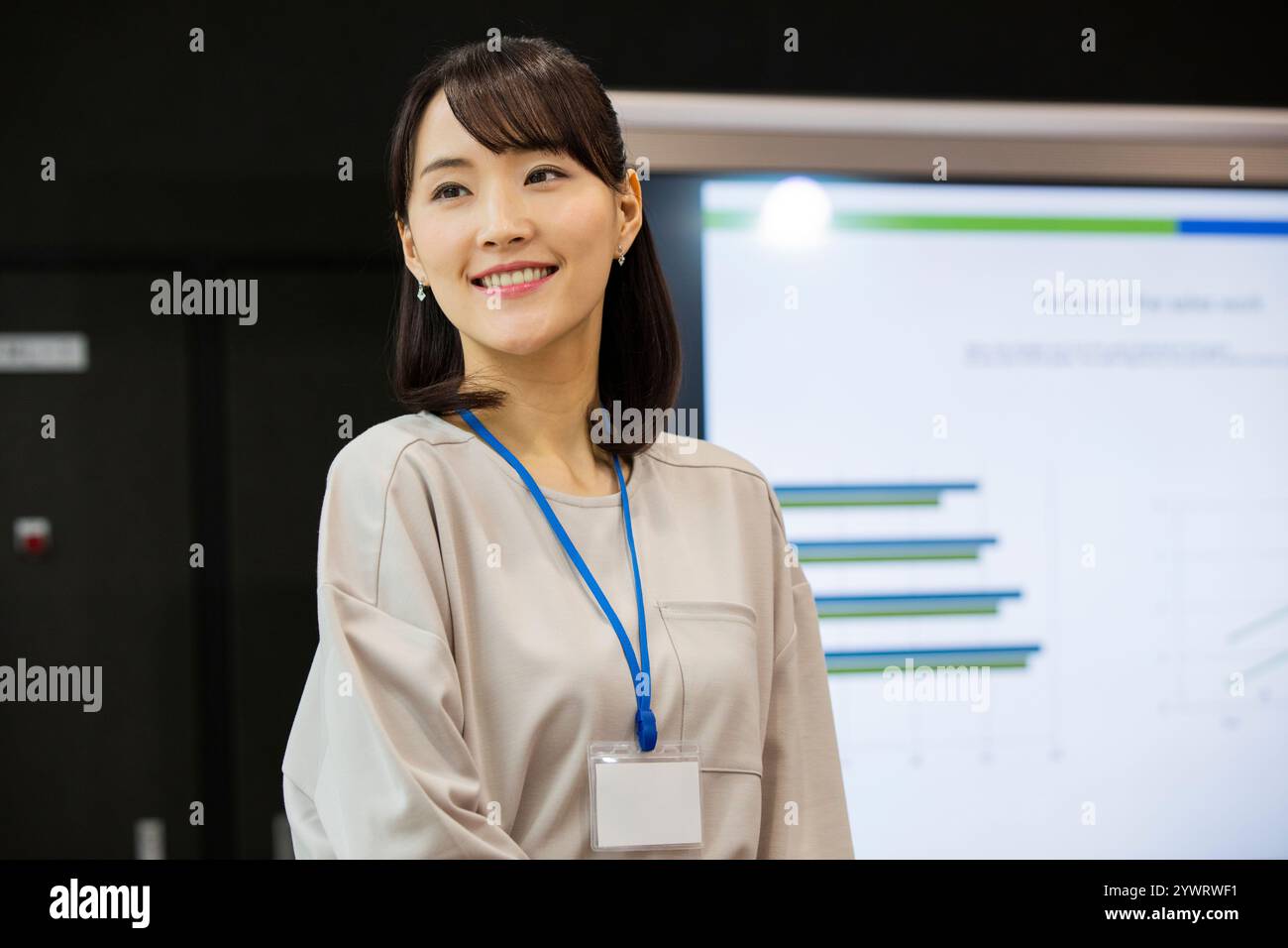 Smiling Japanese business woman Stock Photo - Alamy