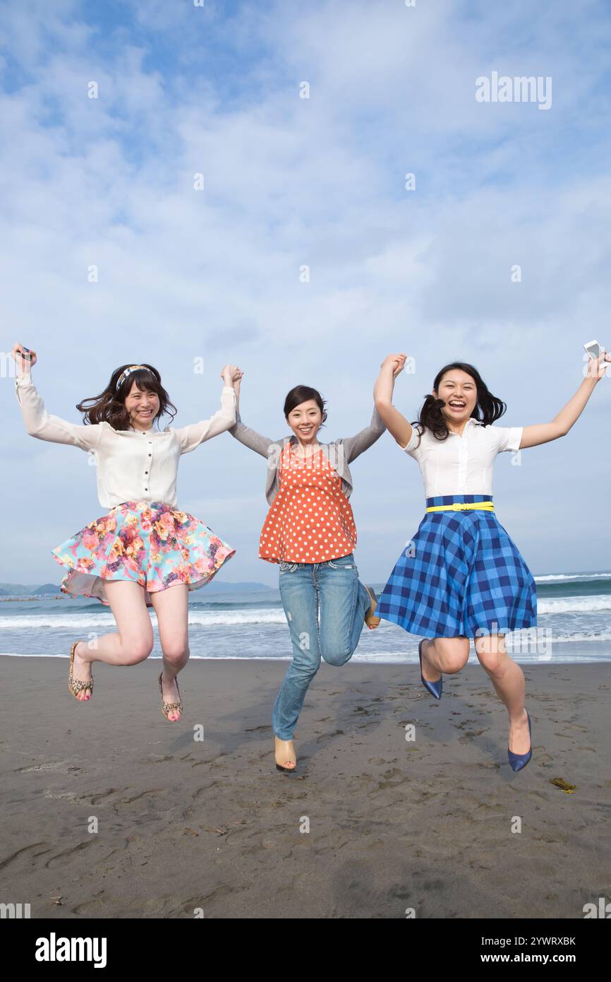 Japanese women jumping for hi-res stock photography and images - Alamy