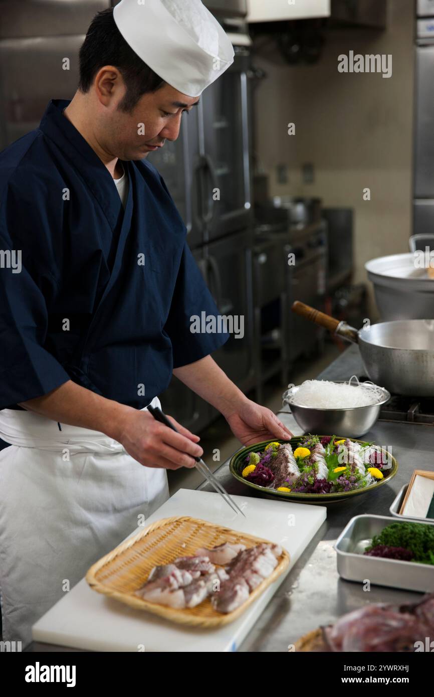 The cook who arranges the sea bream matsubi zukuri Stock Photo - Alamy