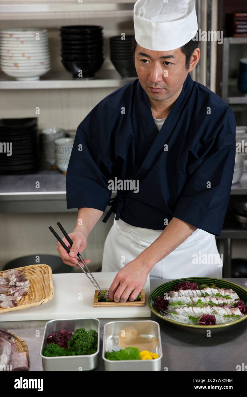 The cook who arranges the sea bream matsubi zukuri Stock Photo - Alamy