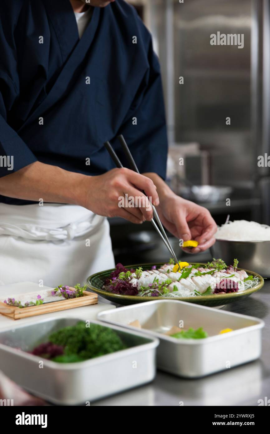 The cook who arranges the sea bream matsubi zukuri Stock Photo - Alamy