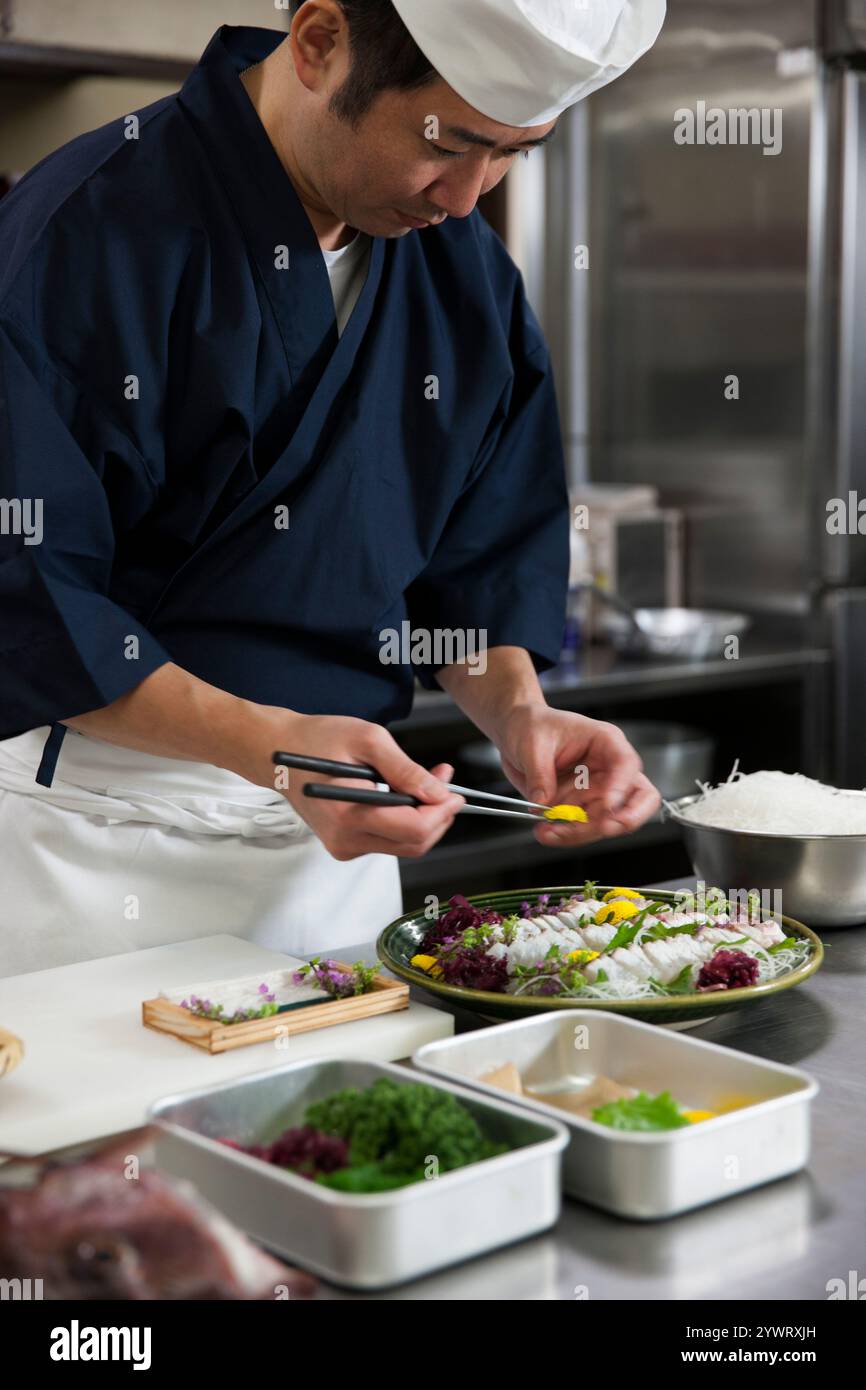 The cook who arranges the sea bream matsubi zukuri Stock Photo - Alamy