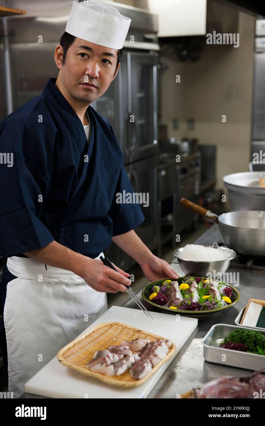 The cook who arranges the sea bream matsubi zukuri Stock Photo - Alamy