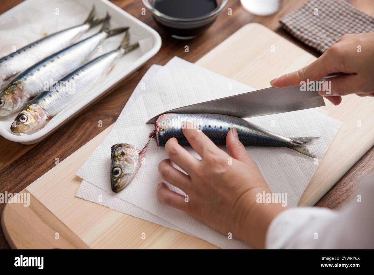 Preparing sardines hi-res stock photography and images - Alamy