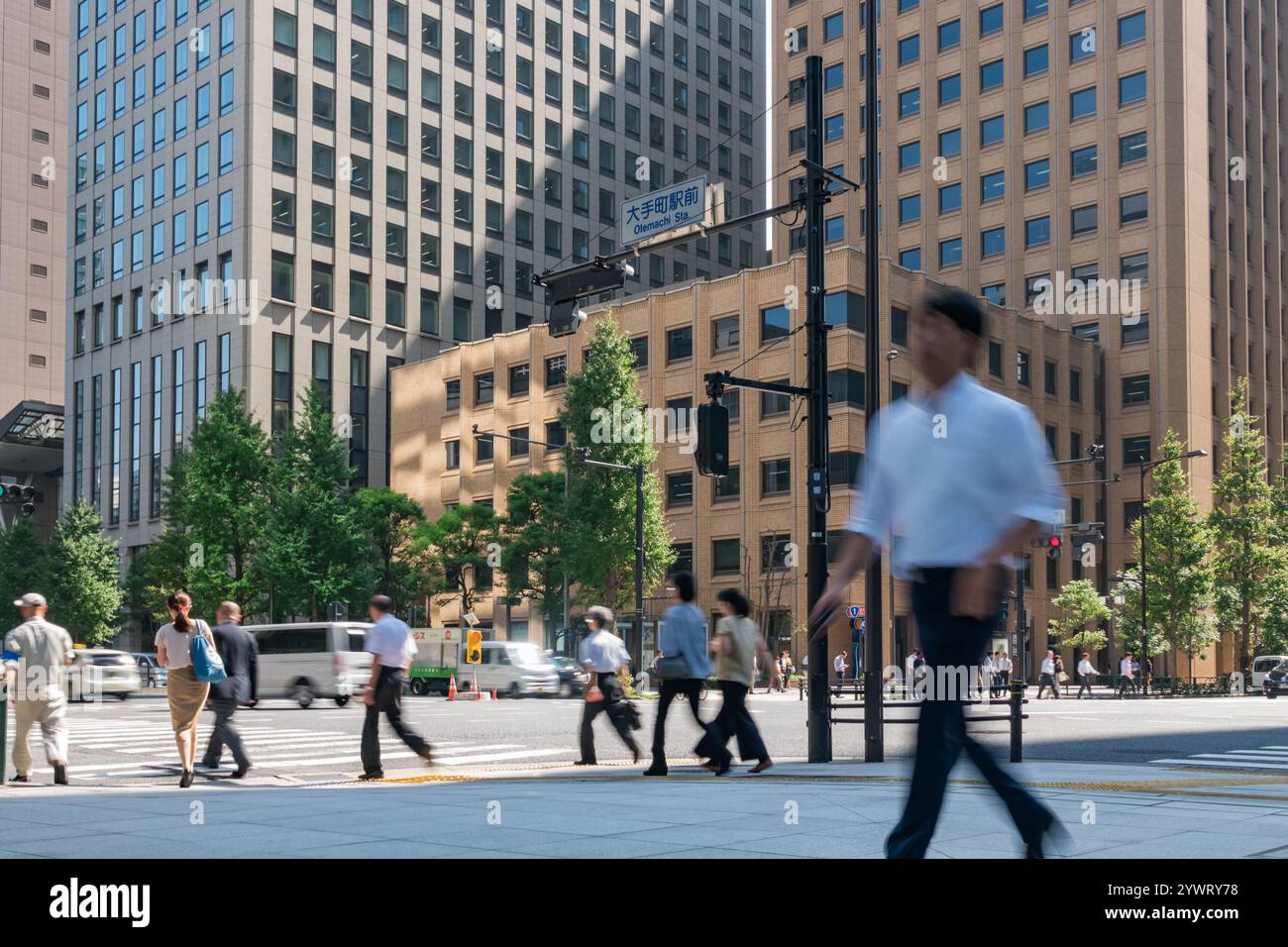 Office building and pedestrians Stock Photo - Alamy