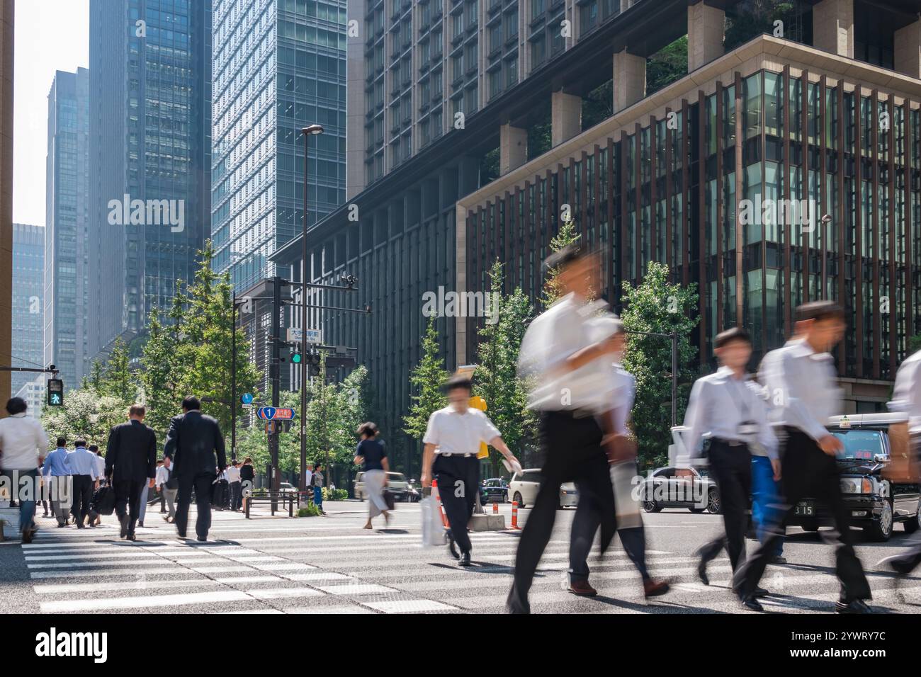 Office building and pedestrians Stock Photo - Alamy