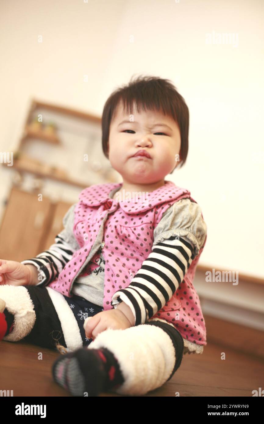 Angry infant girl hi-res stock photography and images - Alamy