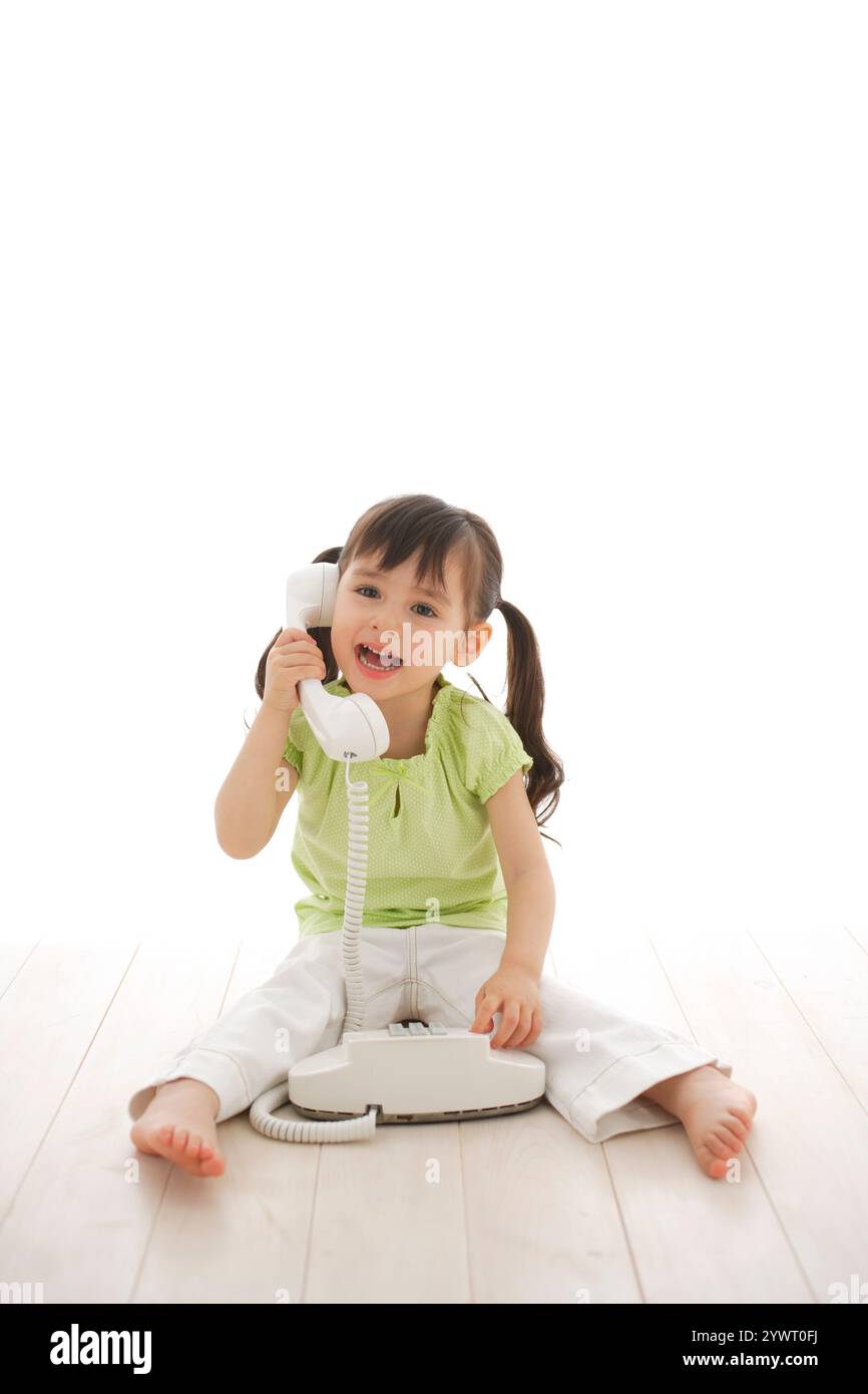 Girl making a telephone call Stock Photo - Alamy