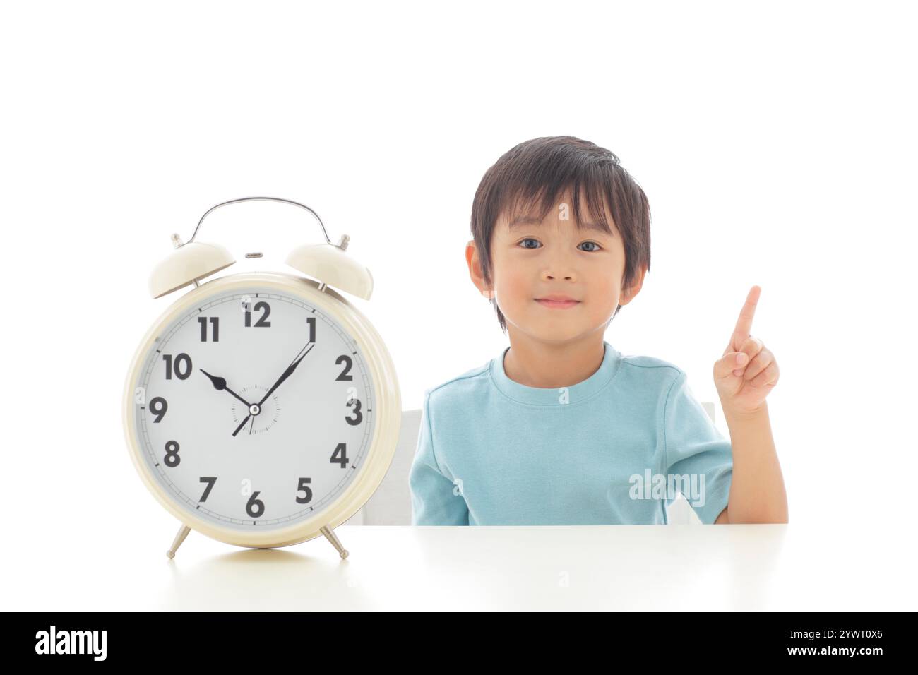 Clock and boy portrait Stock Photo - Alamy