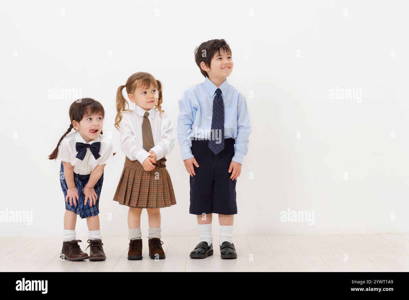 Half boys and girls in school uniform Stock Photo - Alamy