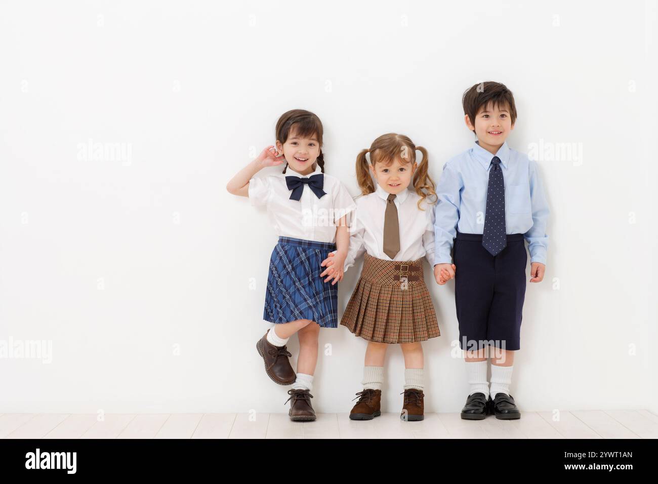 Half boys and girls in school uniform Stock Photo - Alamy