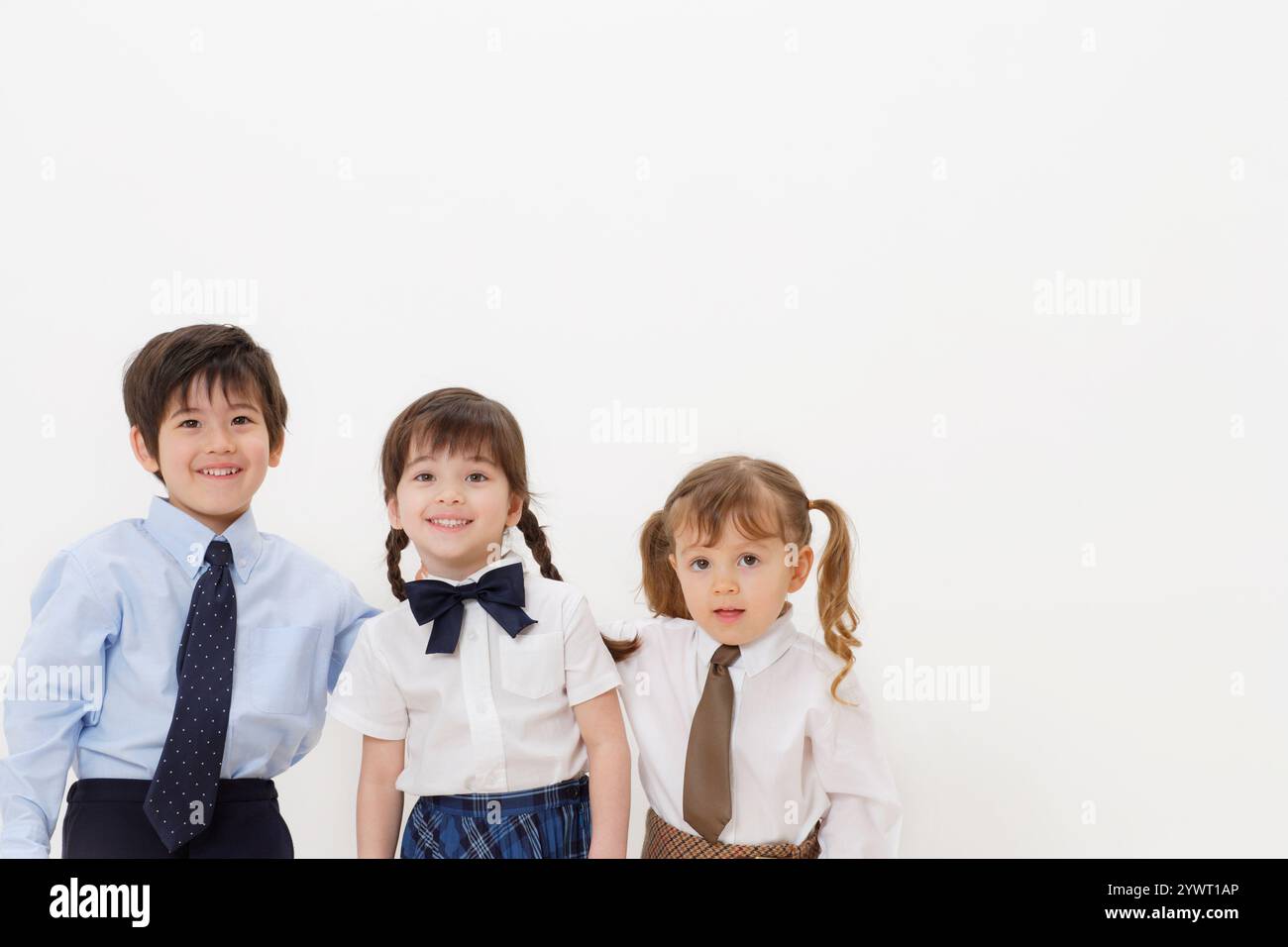 Half boys and girls in school uniform Stock Photo - Alamy