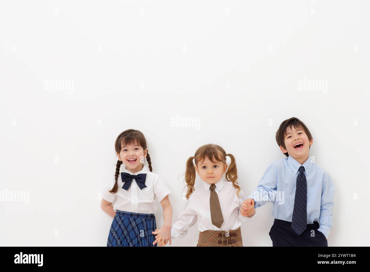 Half boys and girls in school uniform Stock Photo - Alamy