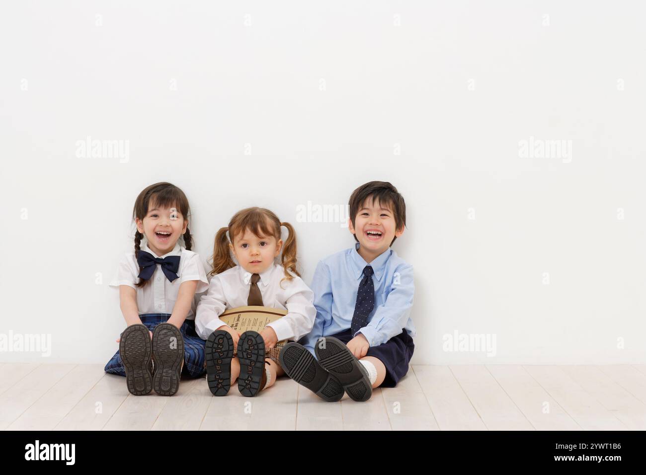 Half boys and girls in school uniform Stock Photo - Alamy