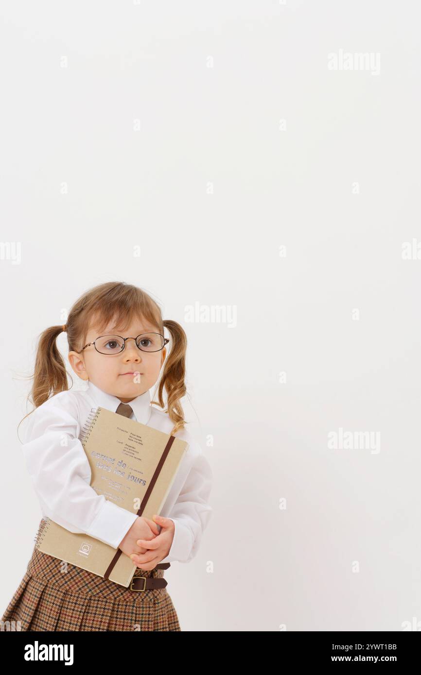 Half girl in school uniform Stock Photo - Alamy
