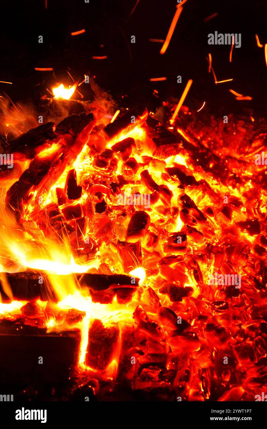 Burning wood with bright red flames Stock Photo - Alamy