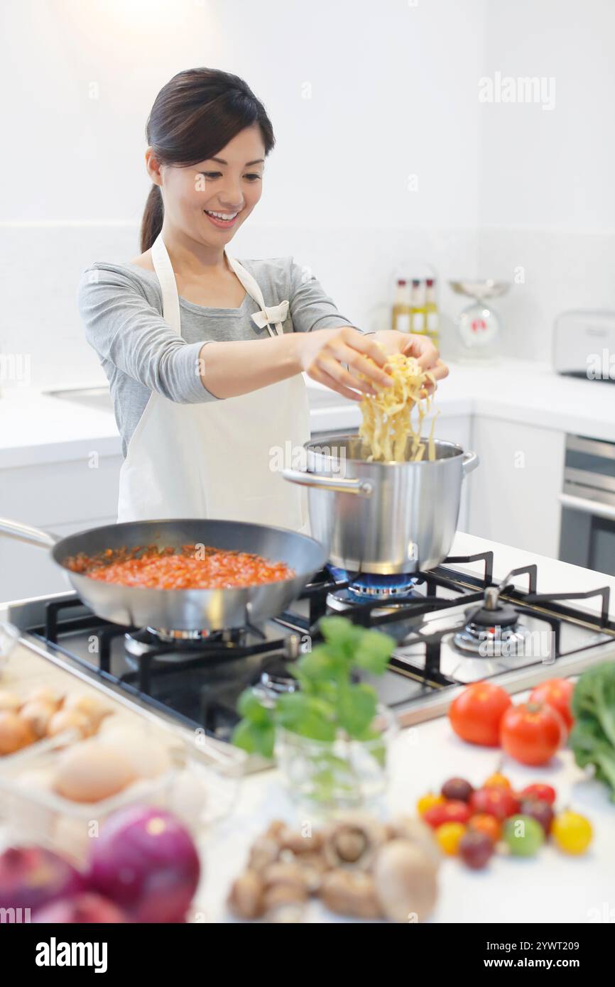 Olive oil pasta eating woman hi-res stock photography and images - Alamy