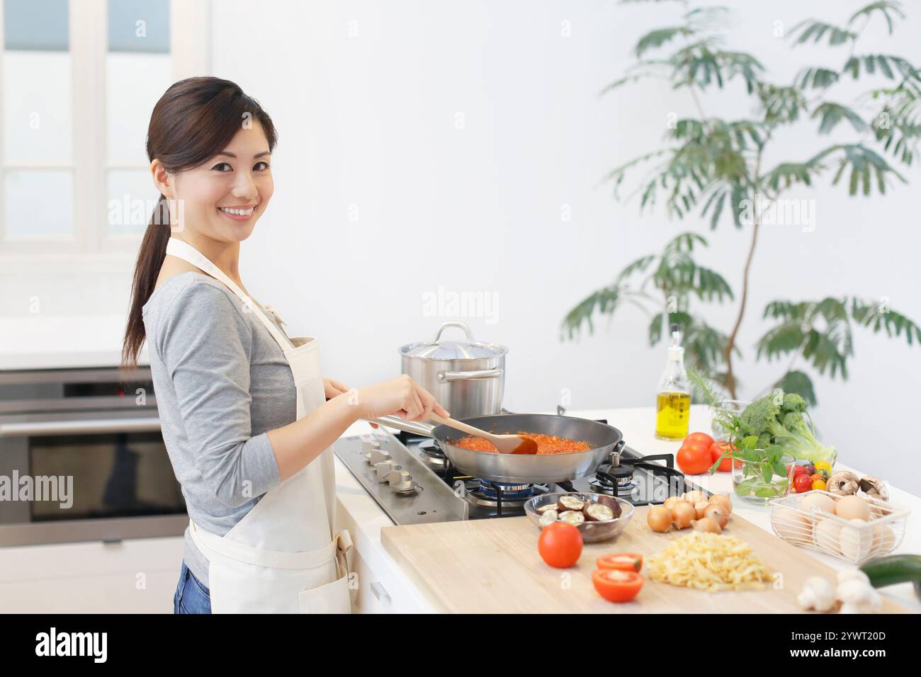 Woman tomato sauce making hi-res stock photography and images - Alamy