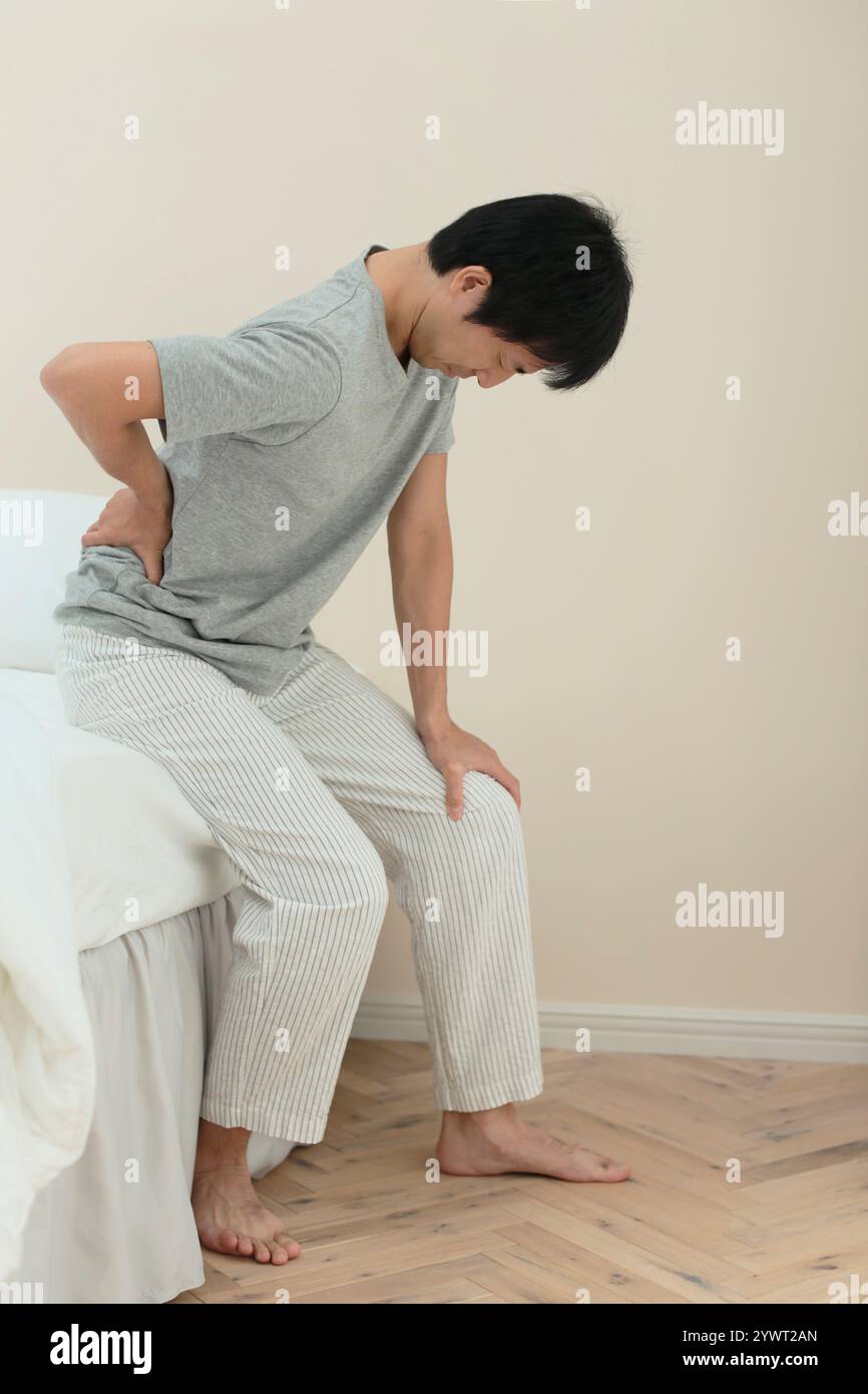 Image of back pain hi-res stock photography and images - Alamy