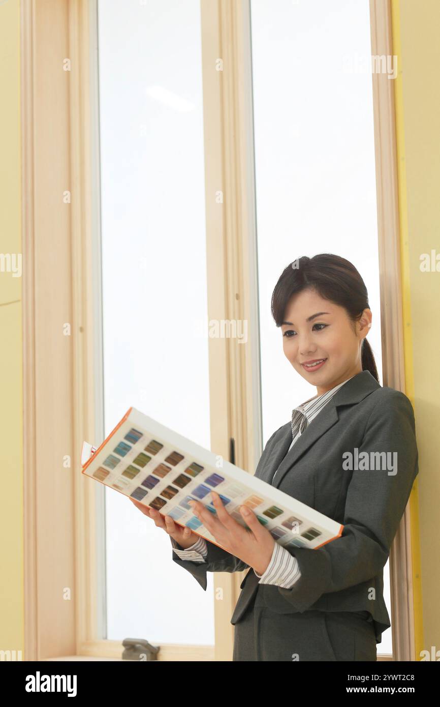 Interior coordinator woman with material samples Stock Photo - Alamy