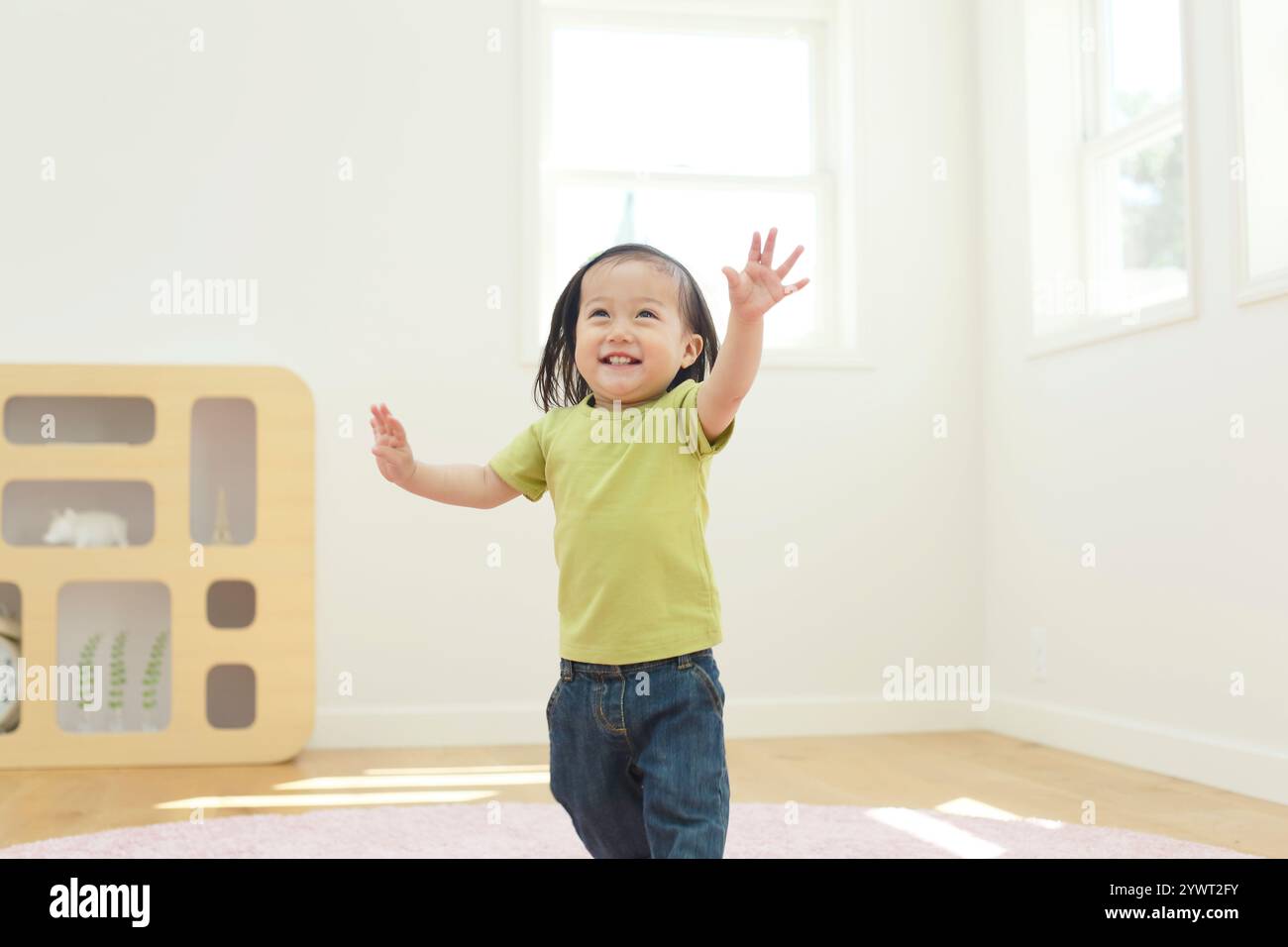 Happy child running through hi-res stock photography and images - Alamy