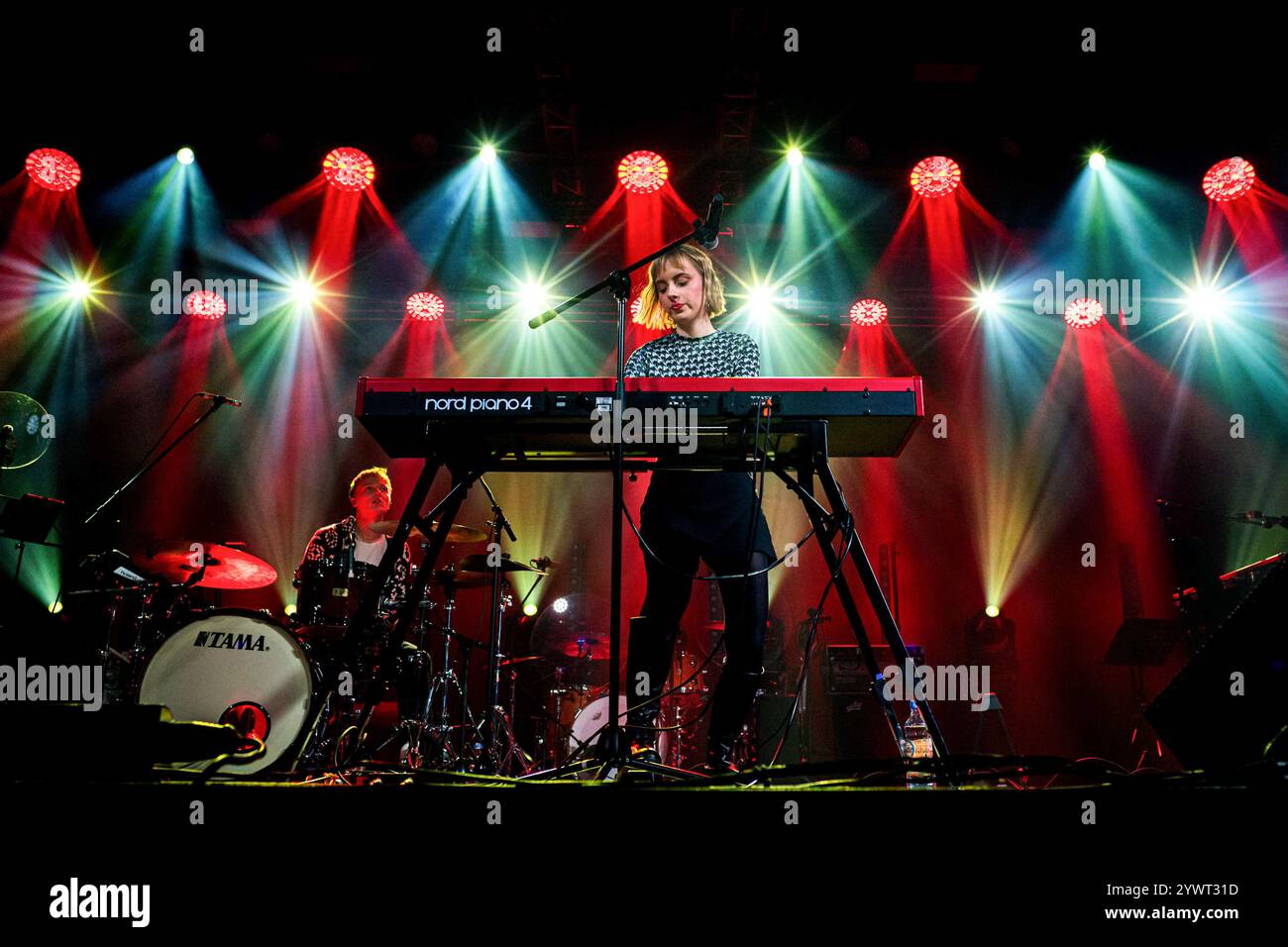 The drummer looks on as Stina Holmquist finishes the third song. German ...