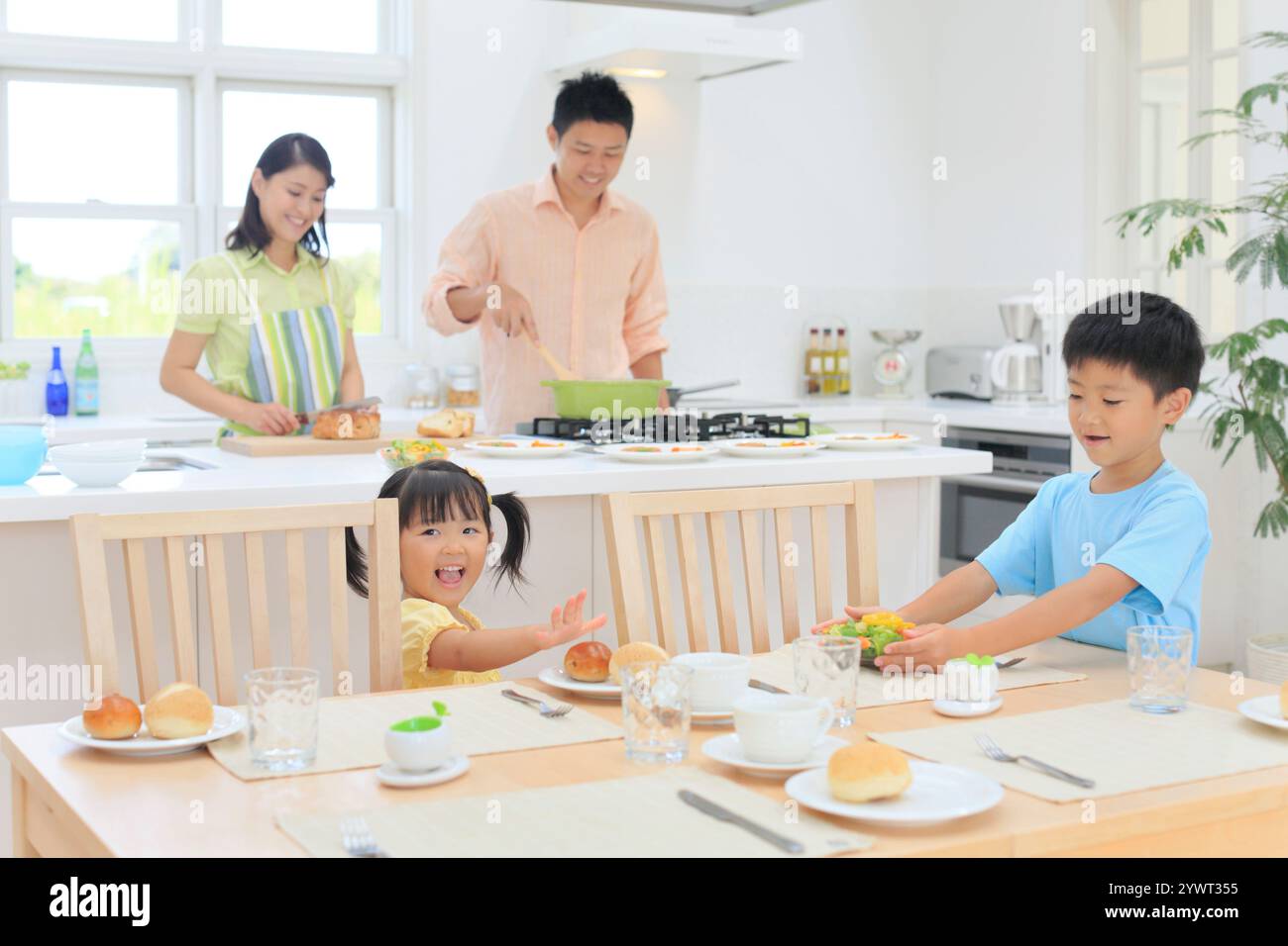 Parents watch children in room hi-res stock photography and images - Alamy