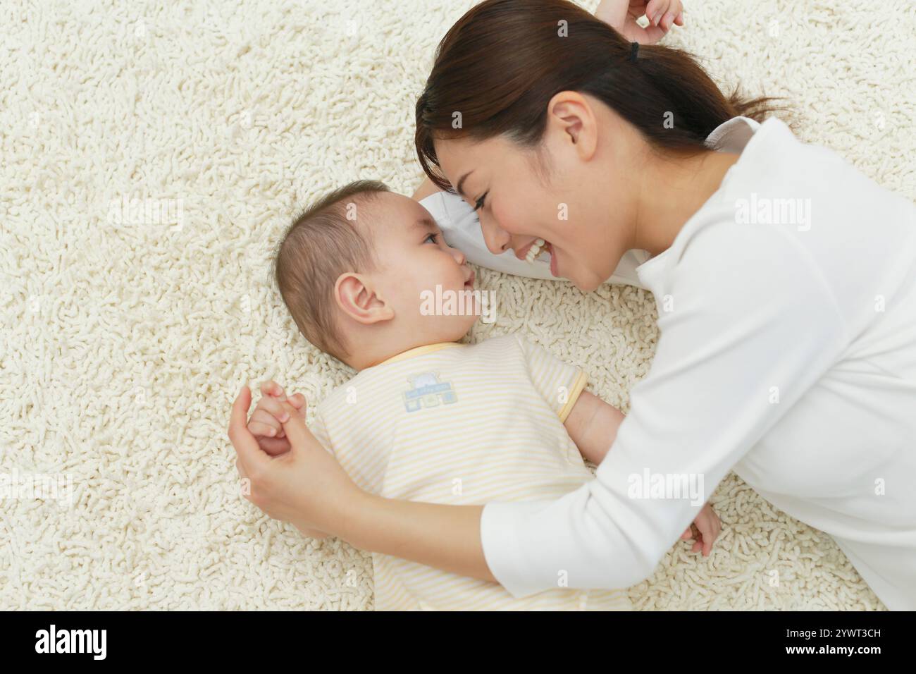 Baby lying down in hi-res stock photography and images - Alamy